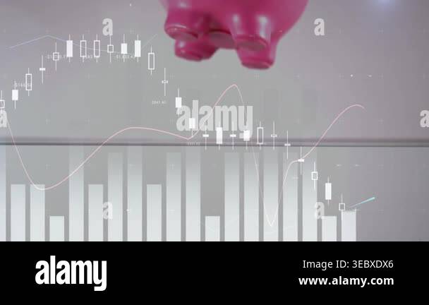 Pink piggy bank dropping into water making crown splash and bubbles ...