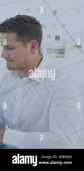 Vertical video: Man holding device looking right and viewing moving ...