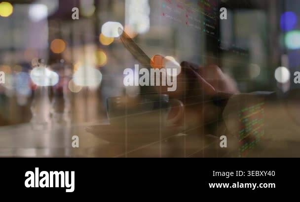 Man lifting phone, tapping and scrolling, checking stocks as charts ...