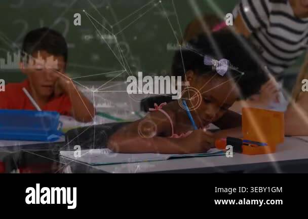 Vertical video: Girl writing at desk looking up and smiling while ...