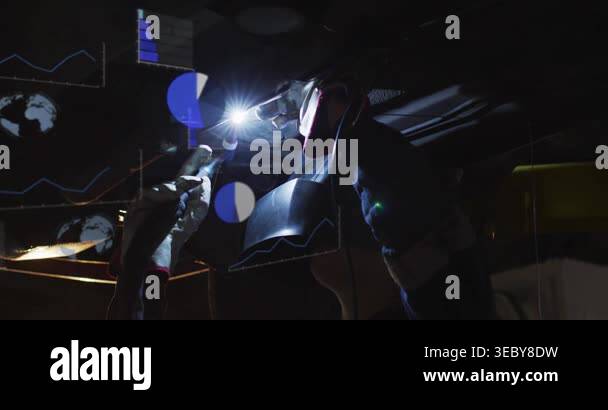Welder striking torch arc under automotive chassis, overlays showing ...