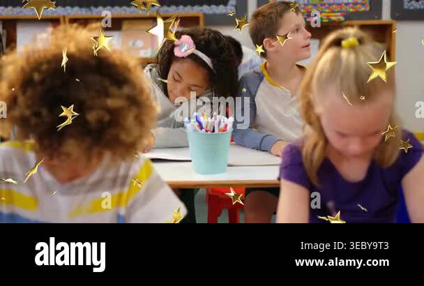 Vertical video: Students writing for classwork as gold stars drifting ...