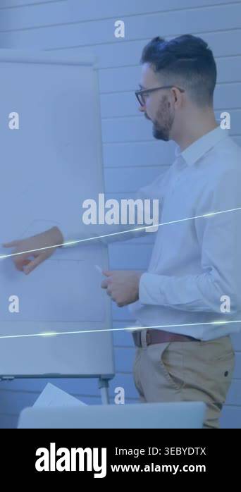 Pointing presenter in white shirt explaining flipchart in meeting room ...