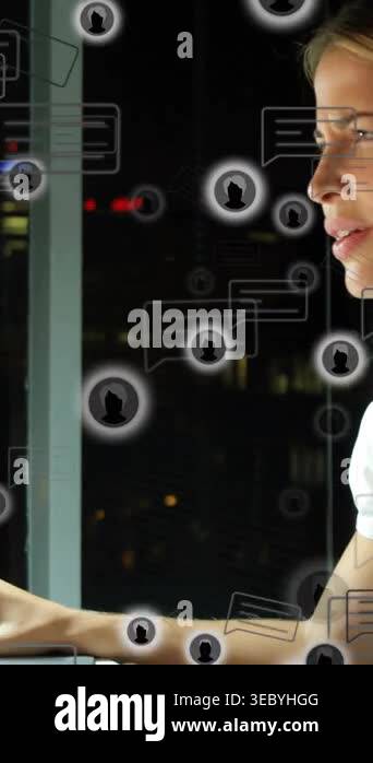 Vertical video: Woman typing laptop by window making IT chat overlays ...