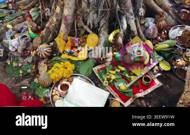traditional puja arrangement with diyas coconuts and offerings at ...