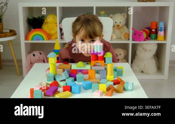 A child plays with wooden blocks. Selective focus. Kid Stock Video ...