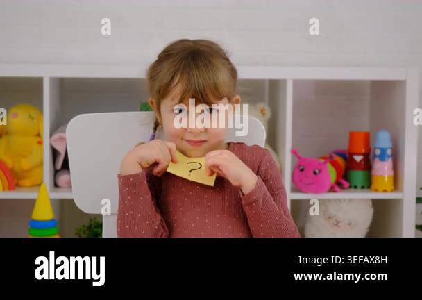 The child learns English letters. Selective focus. Kid Stock Video ...