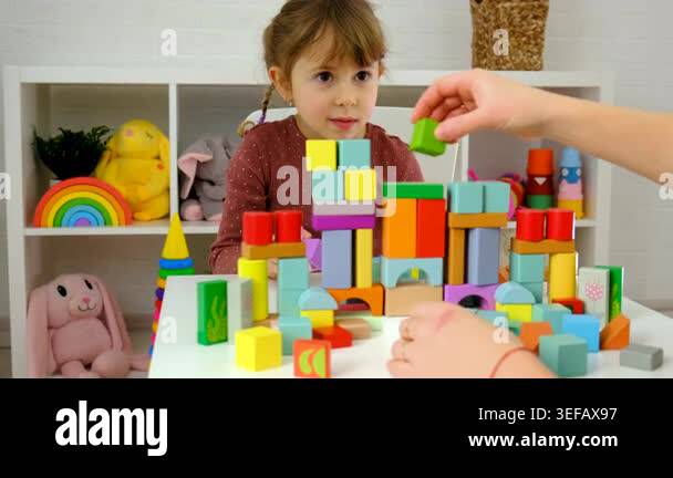 A child plays with wooden blocks. Selective focus. Kid Stock Video ...