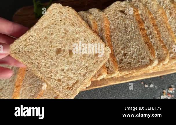 Whole-grain bread fresh baked goods, fluffy bread slices tasty snack ...