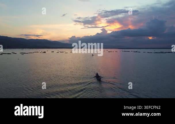 Aerial View of Boats on Lake During Sunset Stock Video Footage - Alamy
