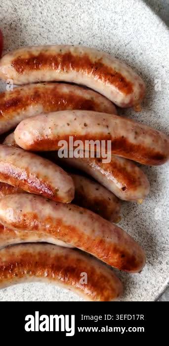 Grilled or barbecued chicken sausages for the dinner table. Grilled ...