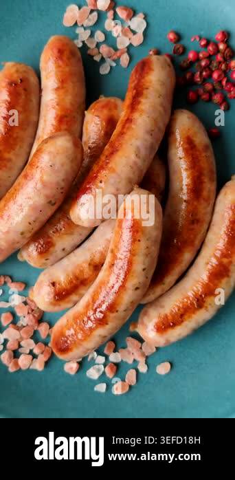 Grilled or barbecued chicken sausages for the dinner table. Grilled ...