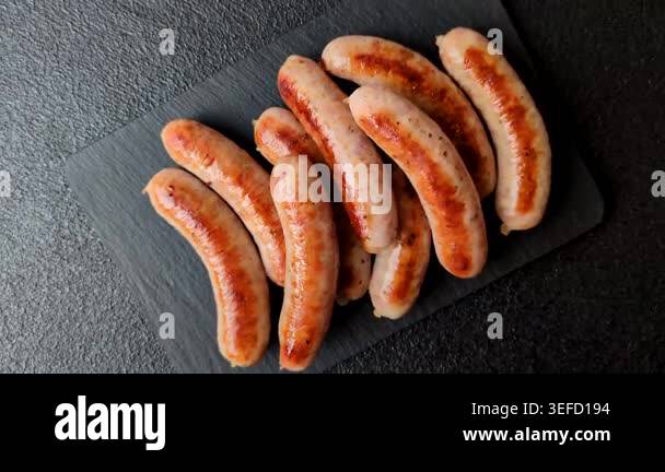 Grilled or barbecued chicken sausages for the dinner table. Grilled ...