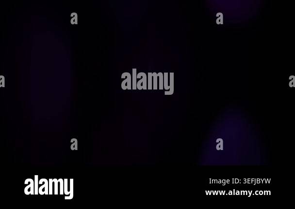 Dynamic abstract background featuring streaks of purple and black light ...