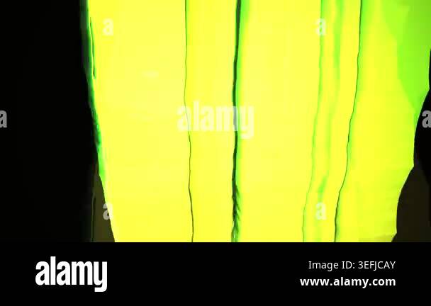 Abstract motion graphic featuring bright yellow neon light effects and ...