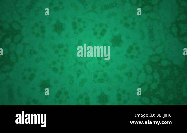 Abstract green motion background featuring soft glowing bokeh particles ...