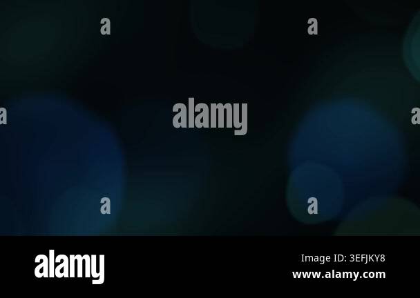 Abstract motion background featuring soft blue and green glowing bokeh ...