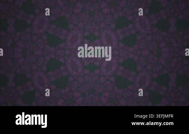 A dark abstract background featuring a subtle geometric pattern with ...