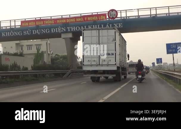 Street scenes in Hai Phong city. Traffic flows continuously at ...