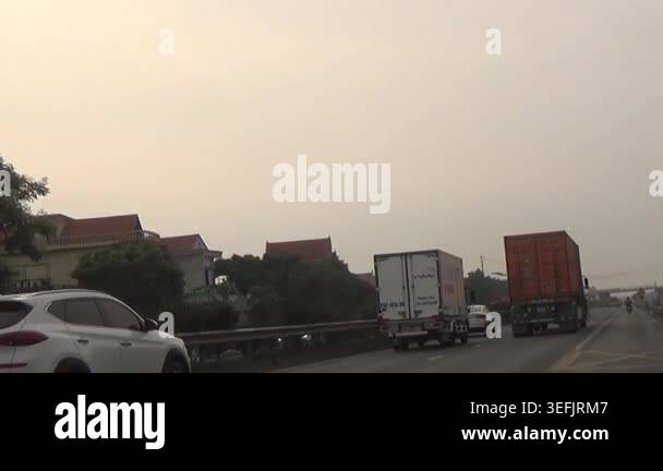 Street scenes in Hai Phong city. Traffic flows continuously at ...