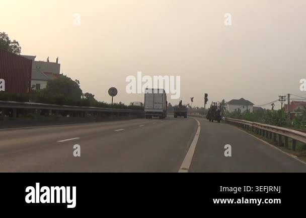 Street scenes in Hai Phong city. Traffic flows continuously at ...