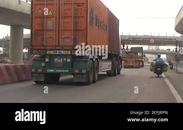 Street scenes in Hai Phong city. Traffic flows continuously at ...