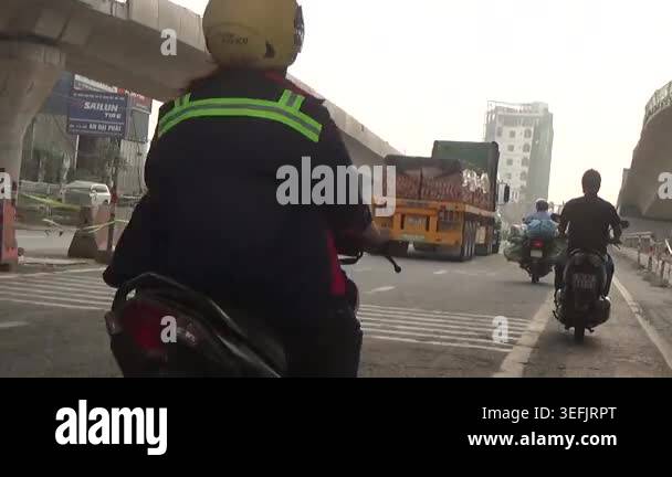 Street scenes in Hai Phong city. Traffic flows continuously at ...