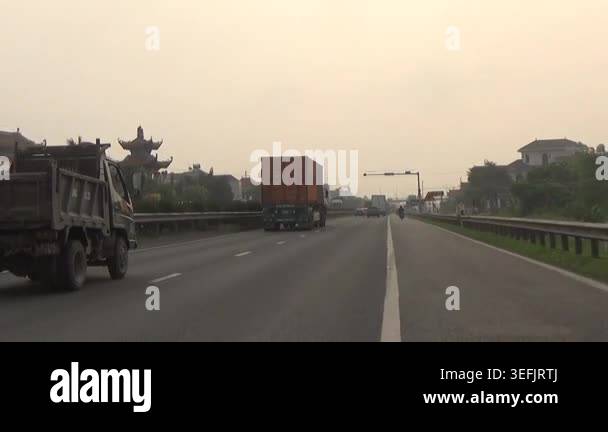 Street scenes in Hai Phong city. Traffic flows continuously at ...