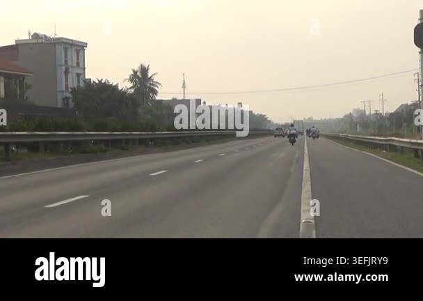 Street scenes in Hai Phong city. Traffic flows continuously at ...