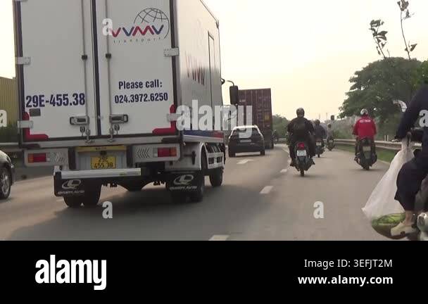 Street scenes in Hai Phong city. Traffic flows continuously at ...