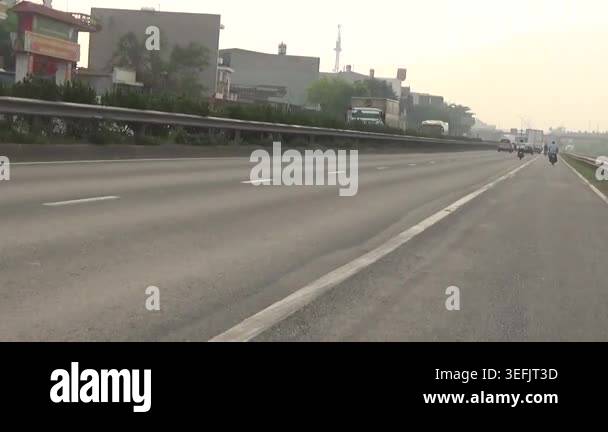 Street scenes in Hai Phong city. Traffic flows continuously at ...