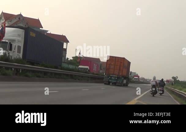 Street scenes in Hai Phong city. Traffic flows continuously at ...