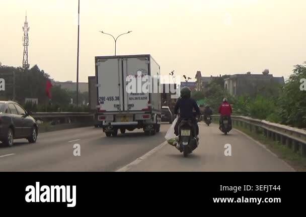 Street scenes in Hai Phong city. Traffic flows continuously at ...