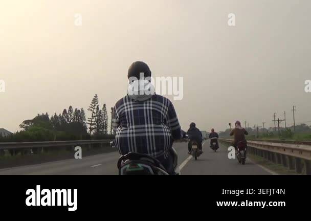 Street scenes in Hai Phong city. Traffic flows continuously at ...