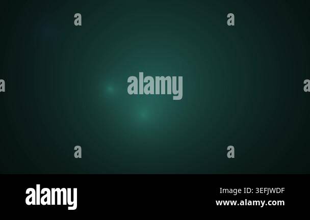 Glowing green light on dark background Stock Video Footage - Alamy