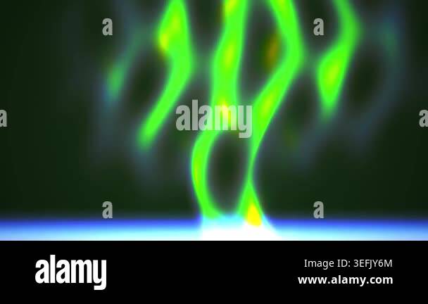 Abstract video of glowing green and yellow energy patterns on a dark ...