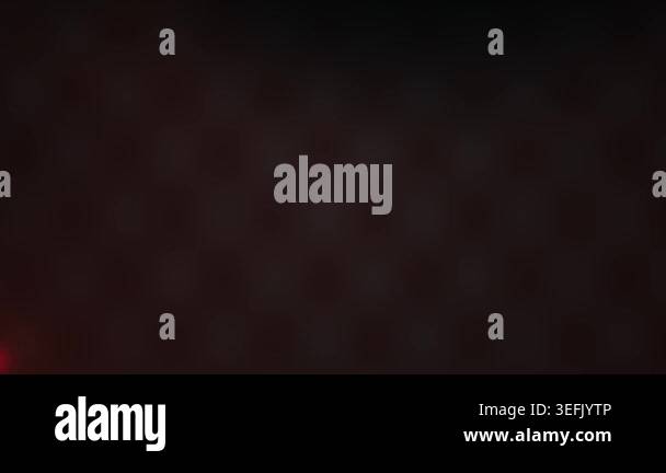A dynamic abstract visual effect featuring a bright red light flare ...