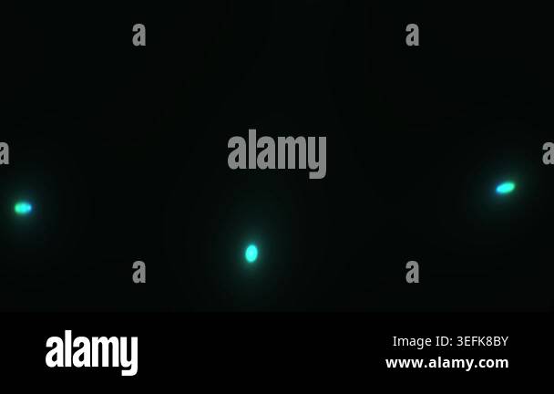 Abstract animation of glowing blue particles floating against a deep ...