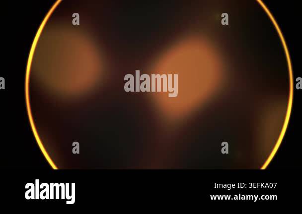 Abstract visual effect featuring soft golden light bokeh circles framed ...