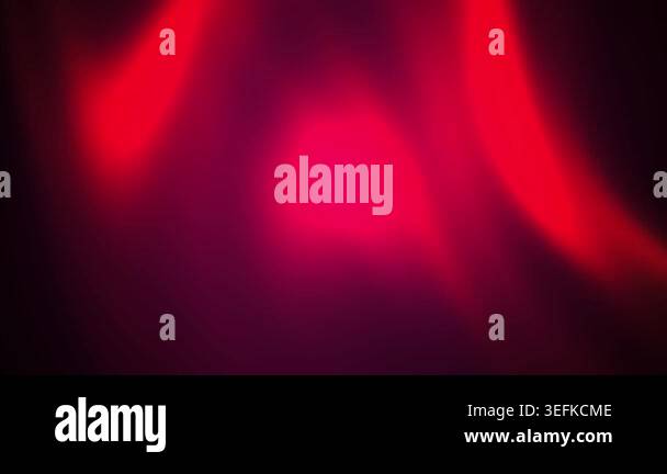 An abstract motion background featuring glowing red light patterns with ...