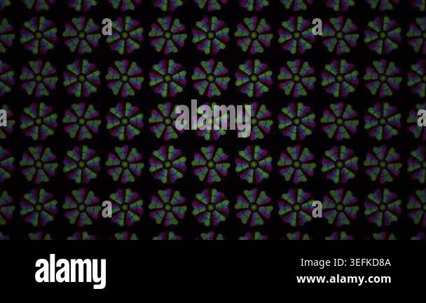 A black background with repeating gray geometric patterns and colorful ...