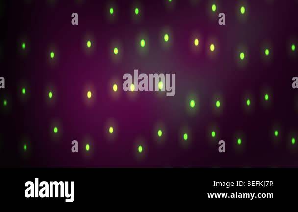 Glowing green and yellow dots on purple and black background Stock ...