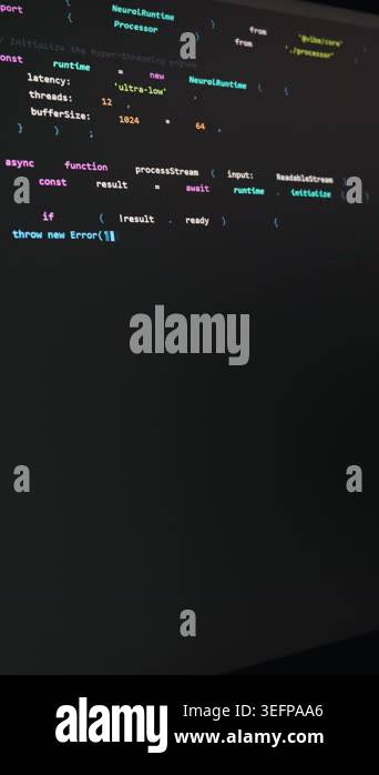 A modern computer monitor displays advanced code for a neural network ...
