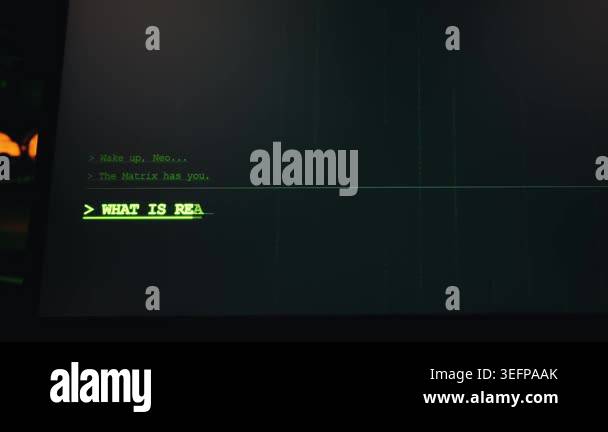 A glowing green computer terminal screen displays the letters wake up ...