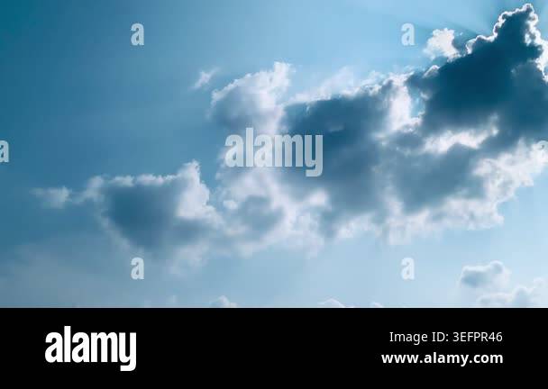 4k dramatic cloud with sun rays shining through blue sky, perfect for ...