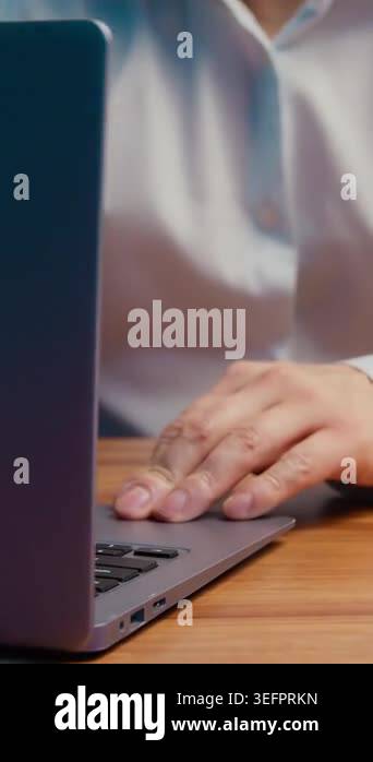 Male hands open laptop at evening office Asian happy businessman start ...