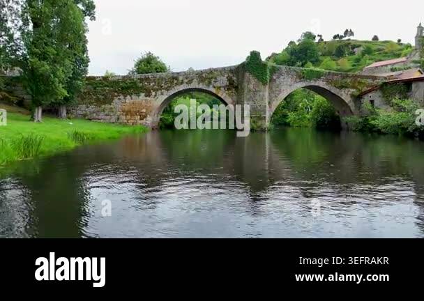 Stone roman bridge of Vilanova over the Arnoia river in Allariz ...