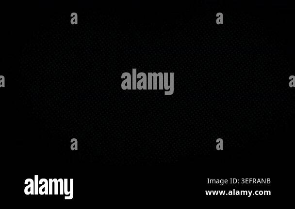 A completely black screen with a very subtle, dark red tint, offering a ...