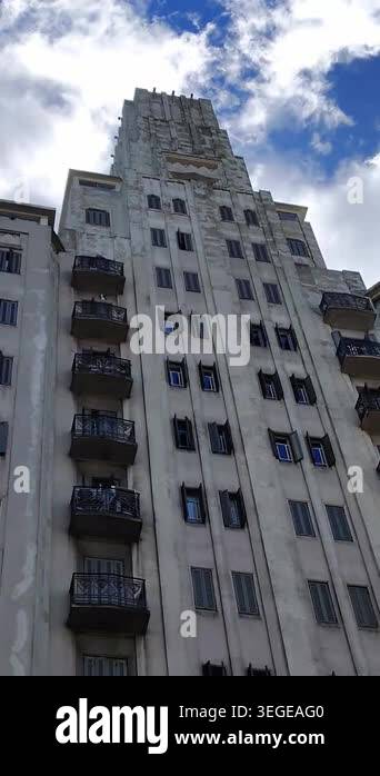 Video showing from below an ornate apartment building with wrought iron ...