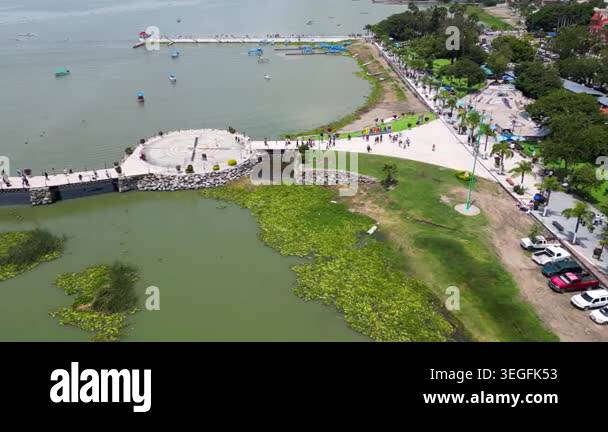 Drone video orbiting the Fishermen Christ statue and pier on Lake ...